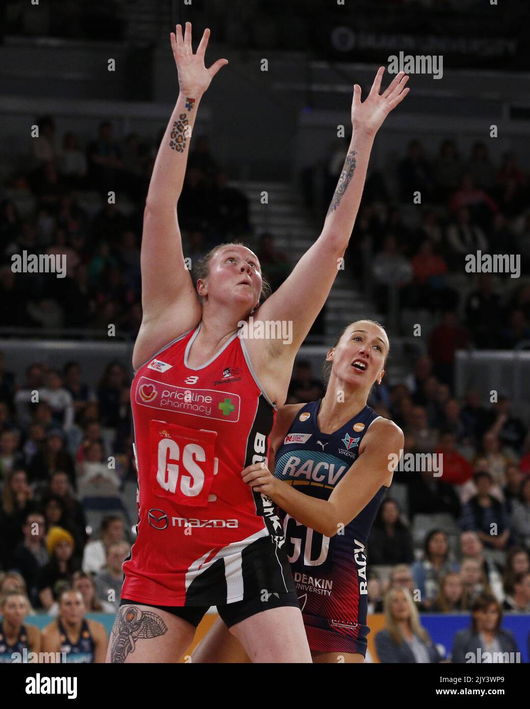 Emma Ryde of the Thunderbirds and Emily Mannix of the Vixens contest ...