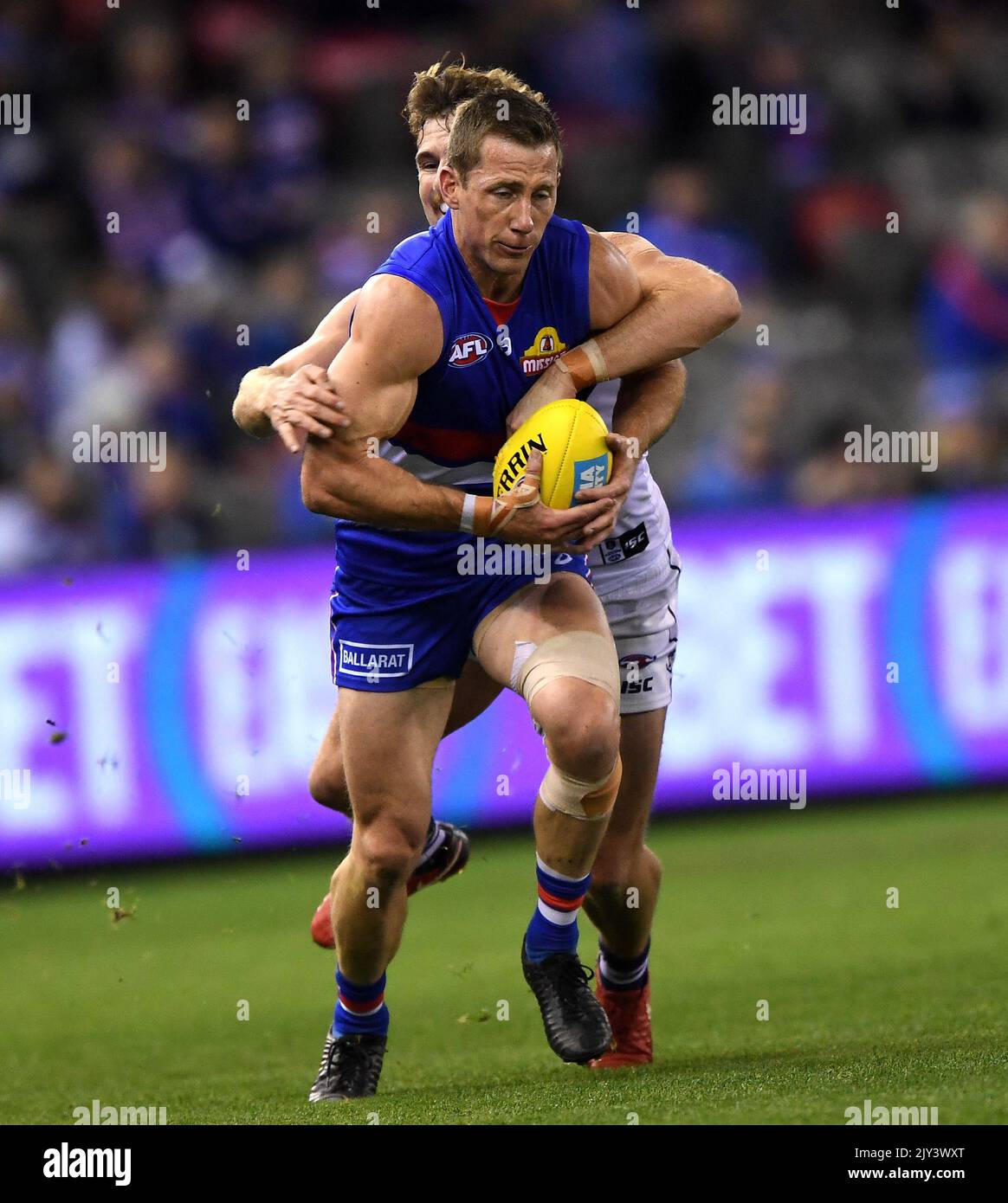 Dale Morris of the Bulldogs (right) and Connor Blakely of the Fremantle ...