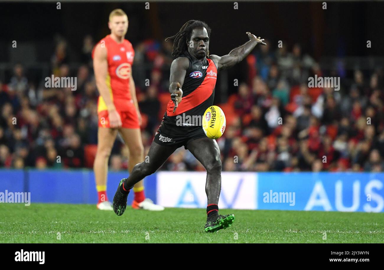 Anthony McDonald-Tipungwuti of the Bombers takes a shot at goal during ...