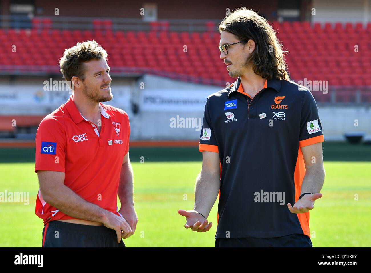 Sydney Swans co-captain Luke Parker with GWS Giants co-captain Phil ...