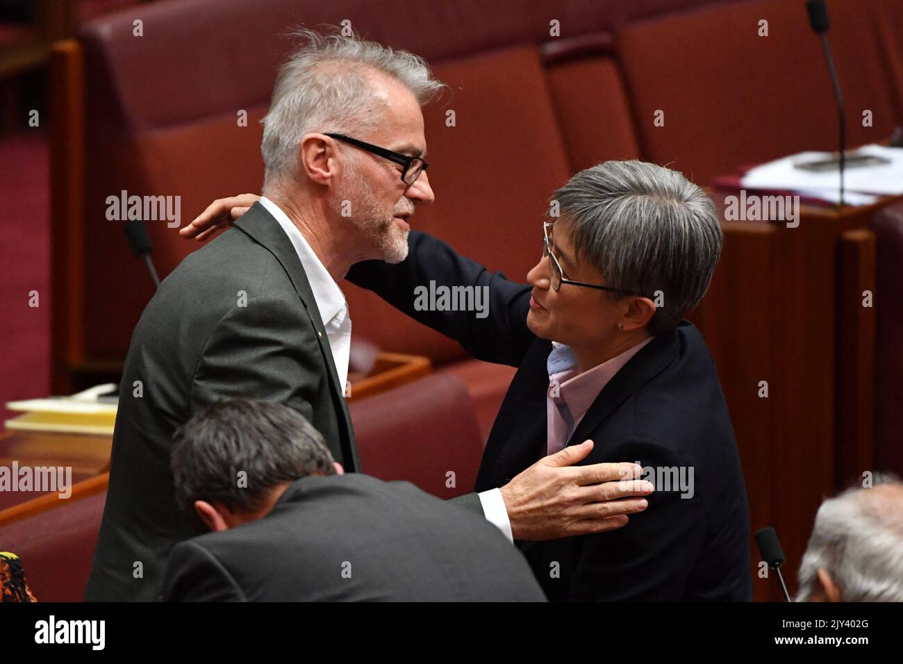 Shadow Minister for Foreign Affairs Penny Wong hugs Labor Senator Tony ...
