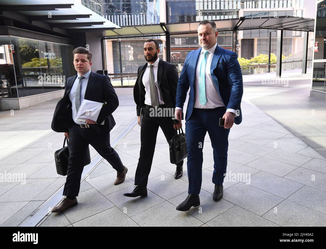 Adam Magill (right) and his lawyer Ahmed Dib (centre) arrive at the ...