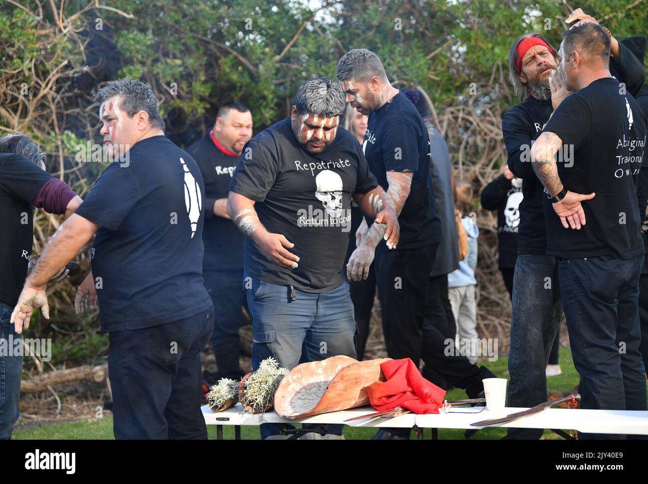 Local Indigenous members are seen during a burial ceremony at Kingston ...