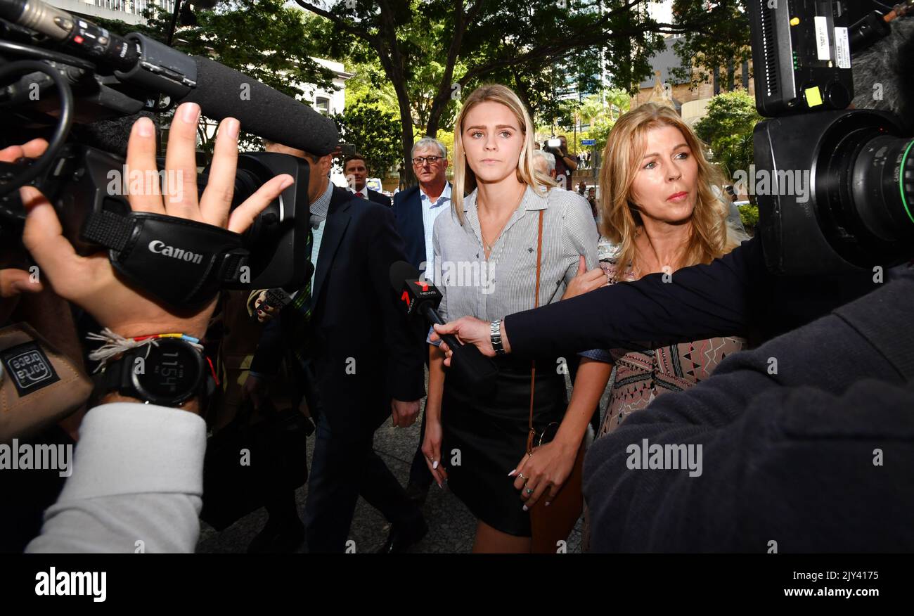 Australian swimmer Shayna Jack (centre) is seen arriving for a briefing ...