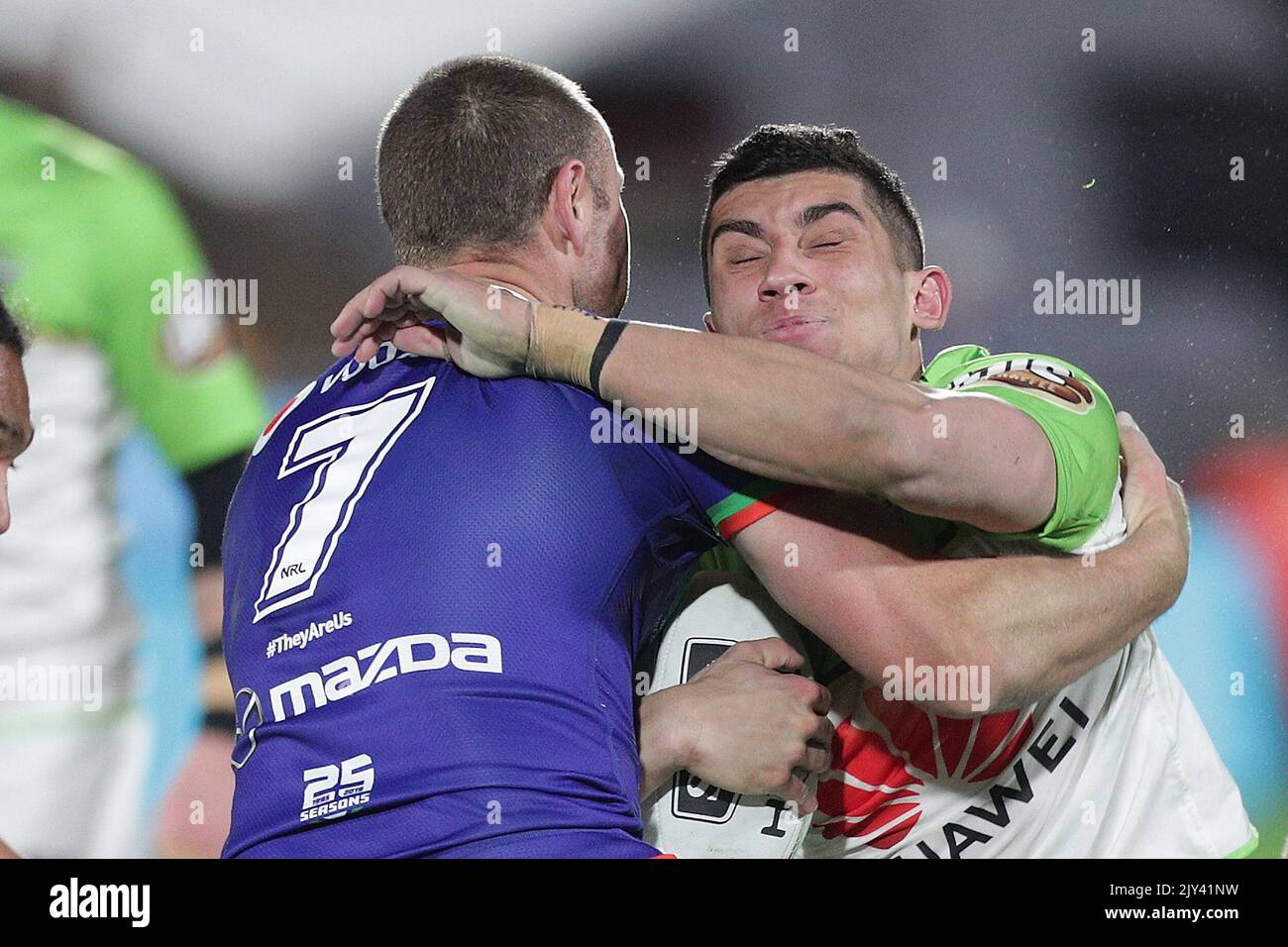 Bailey Simonsson of the Raiders is tackled by Blake Green of the ...