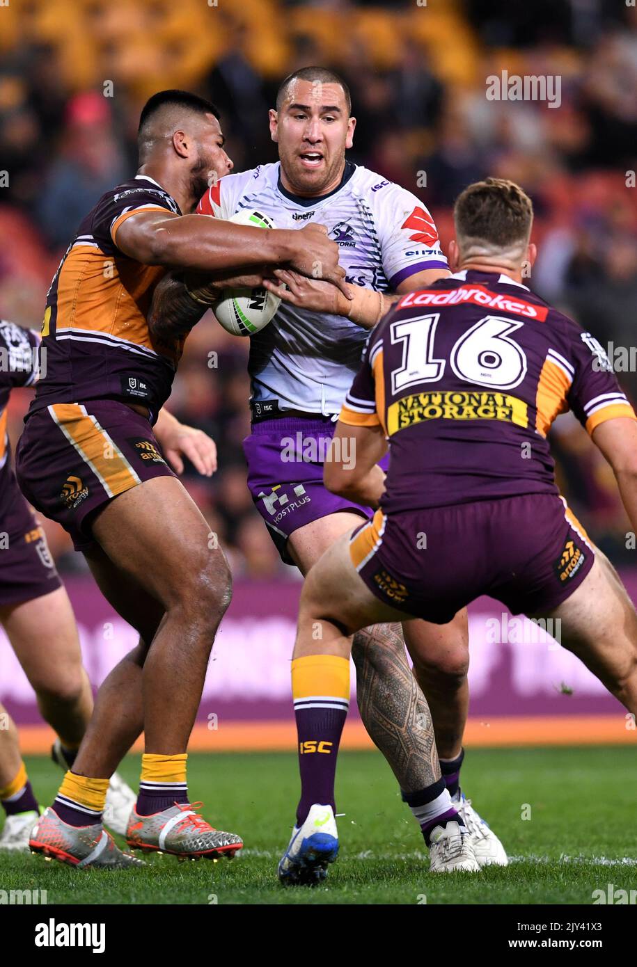 Nelson Asofa-Solomona of the Storm (centre) is tackled during the Round ...