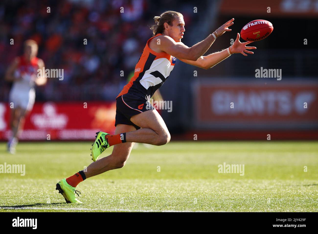 Nick Haynes of the Giants grabs a loose ball during the Round 20 AFL ...