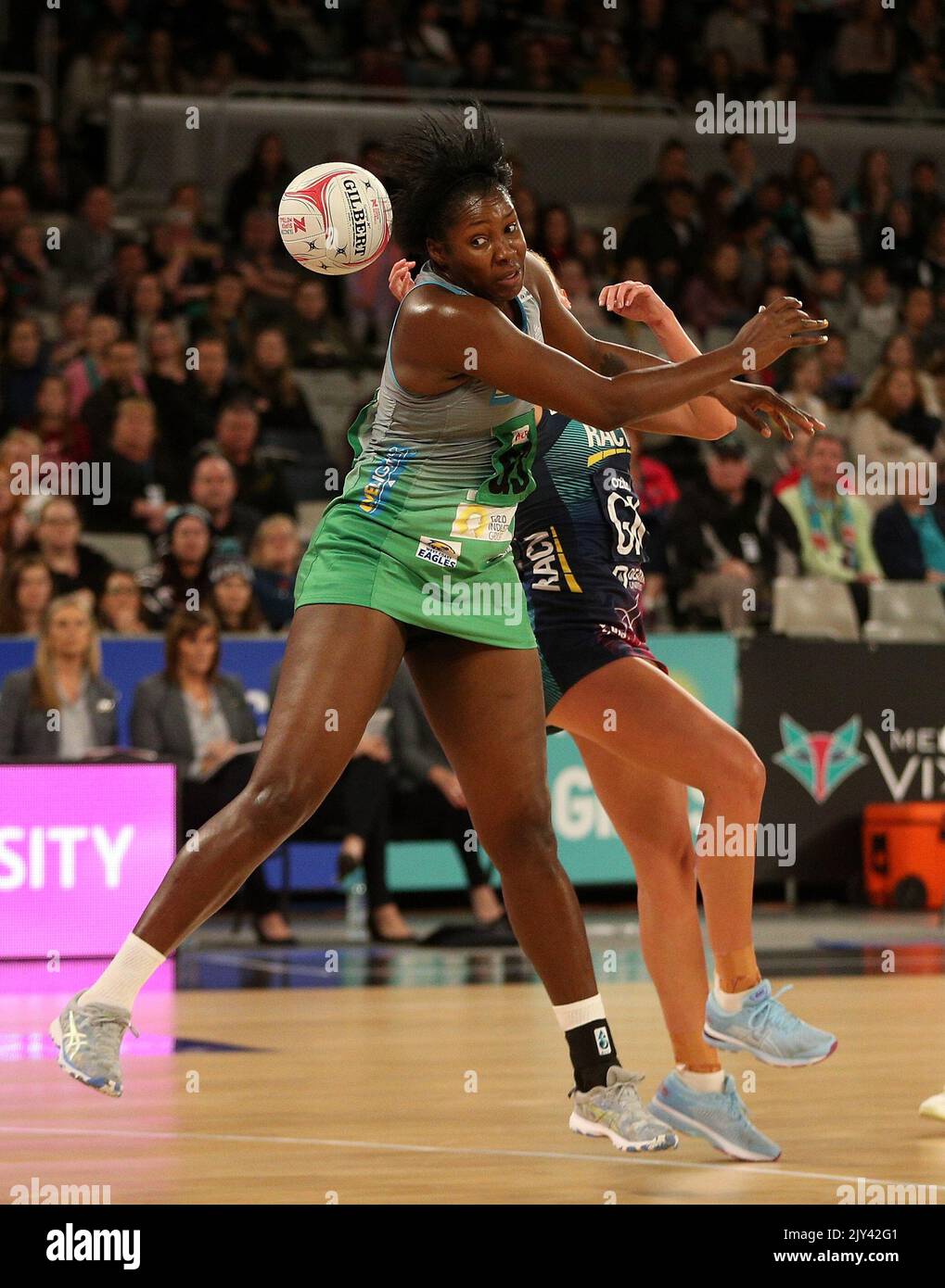 Jhaniele Fowler of the Fever (front) contests with Emily Mannix of the ...