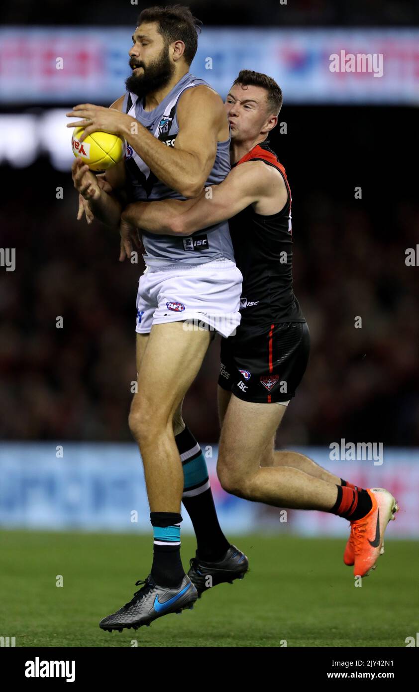 Paddy Ryder of the Power marks ahead of Conor McKenna of the Bombers during the Round 20 AFL ...