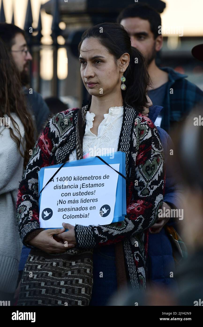 A member of the public holds a sign during a United For Colombia human ...