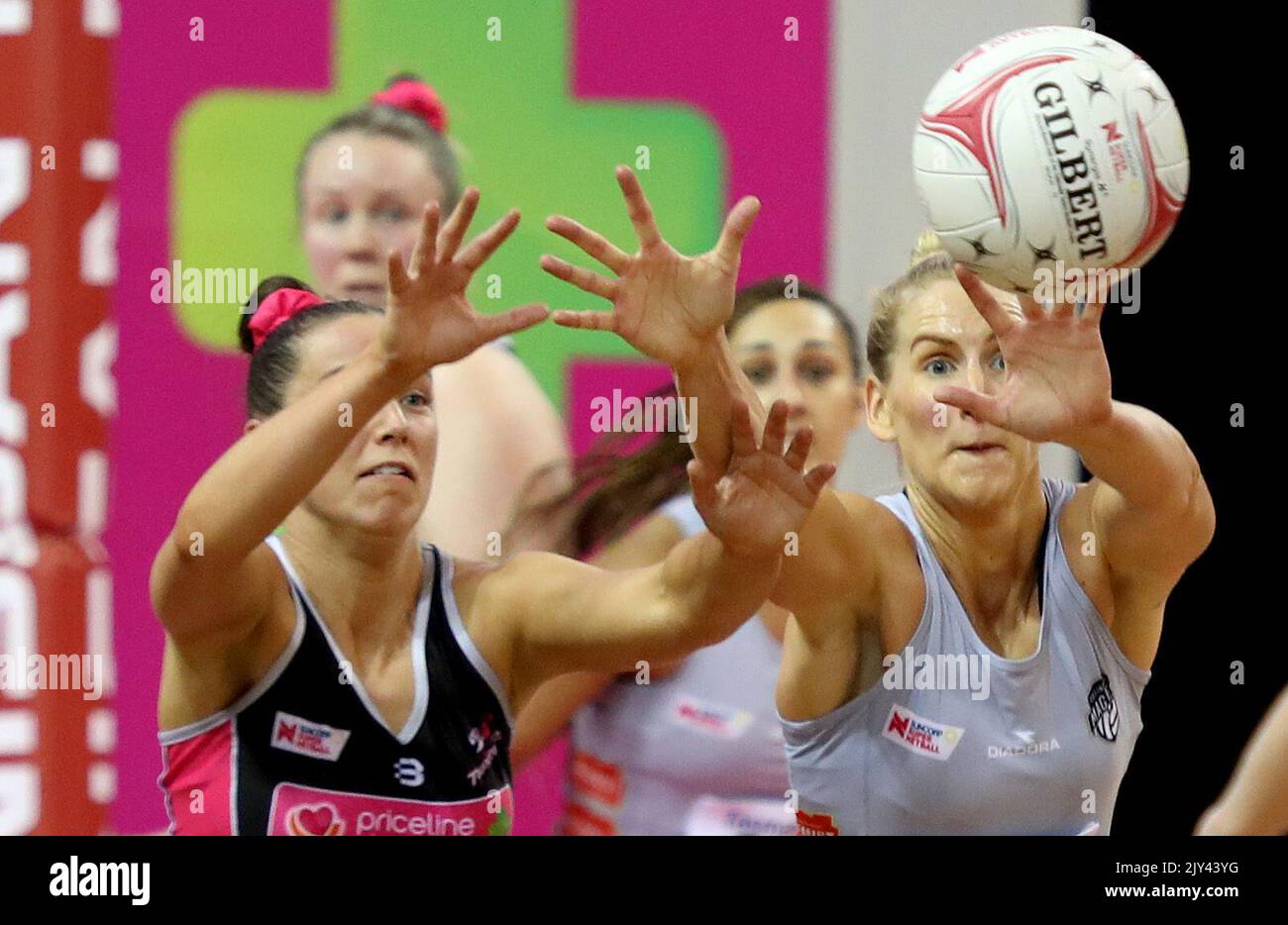 Hannah Petty of the Thunderbirds is beaten to the ball by April ...