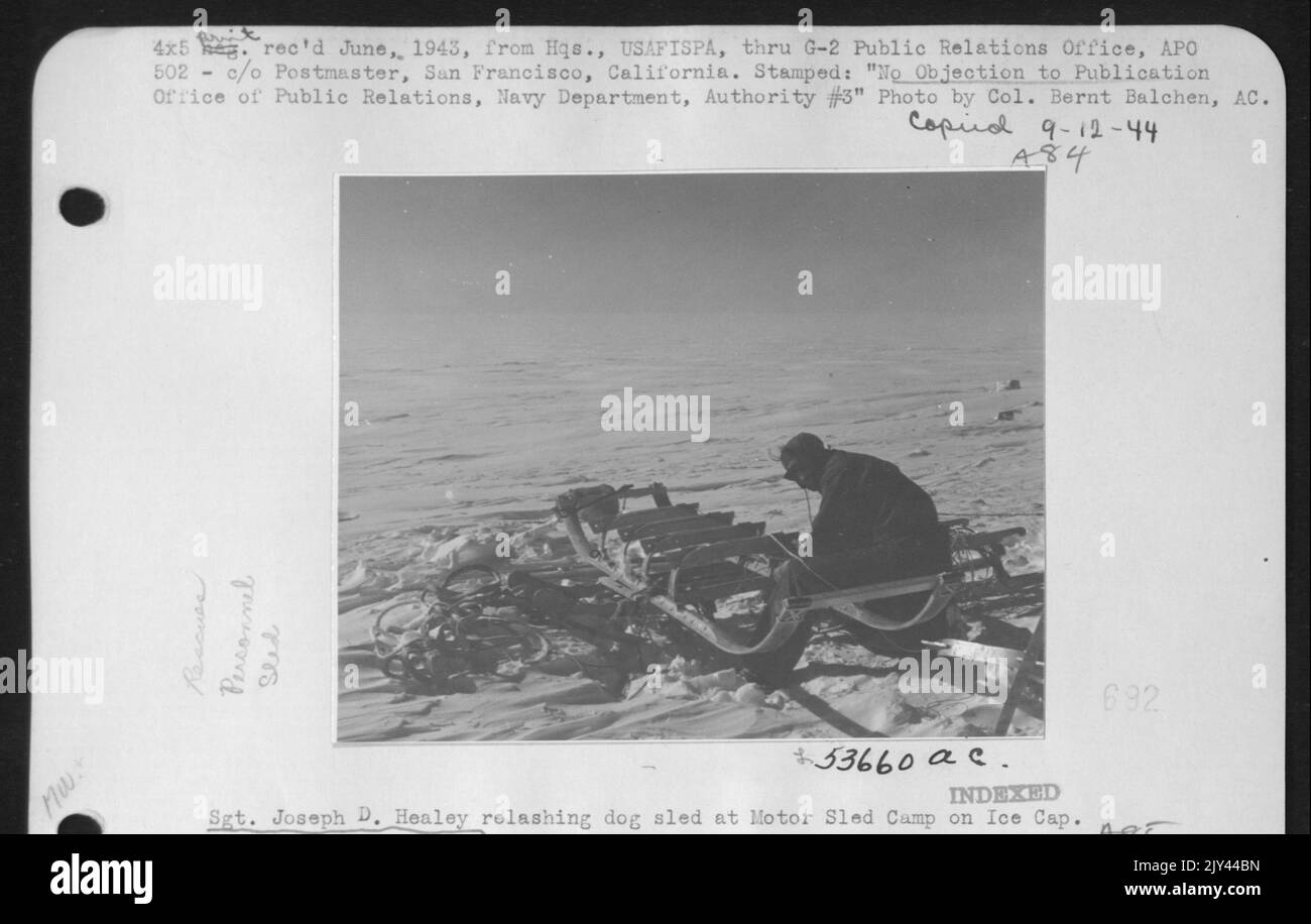 Sergeant Joseph D. Healey Re-Lashing Dog Sled At Motor Sled Camp On Ice ...