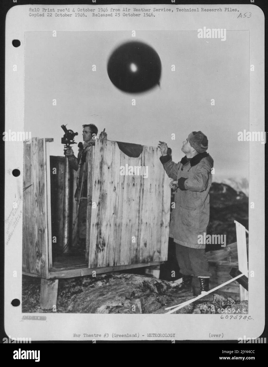 Sgt. Adams And M/Sgt. Trout Releasing Pilot Balloon In Greenland, 1945 ...