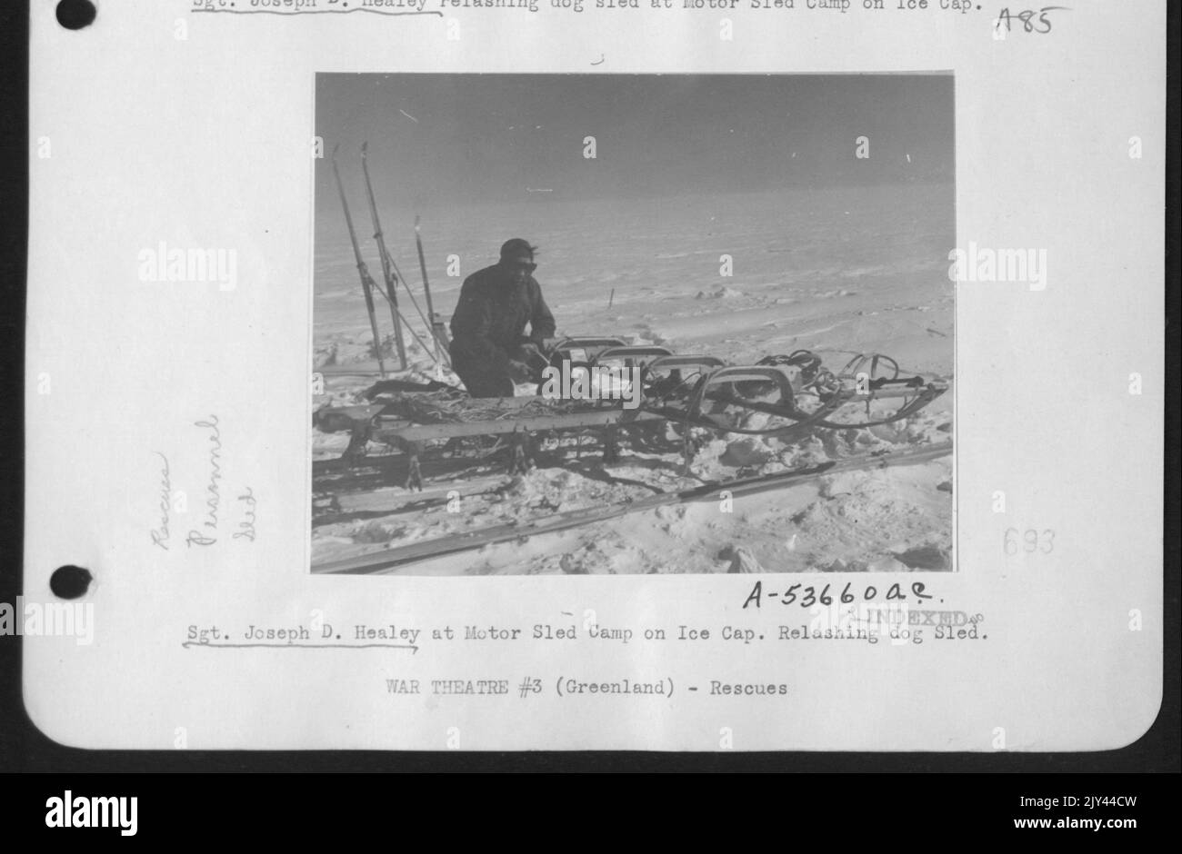 Sergeant Joseph D. Healey At Motor Sled Camp On Ice Cap. Re-Lashing Dog ...