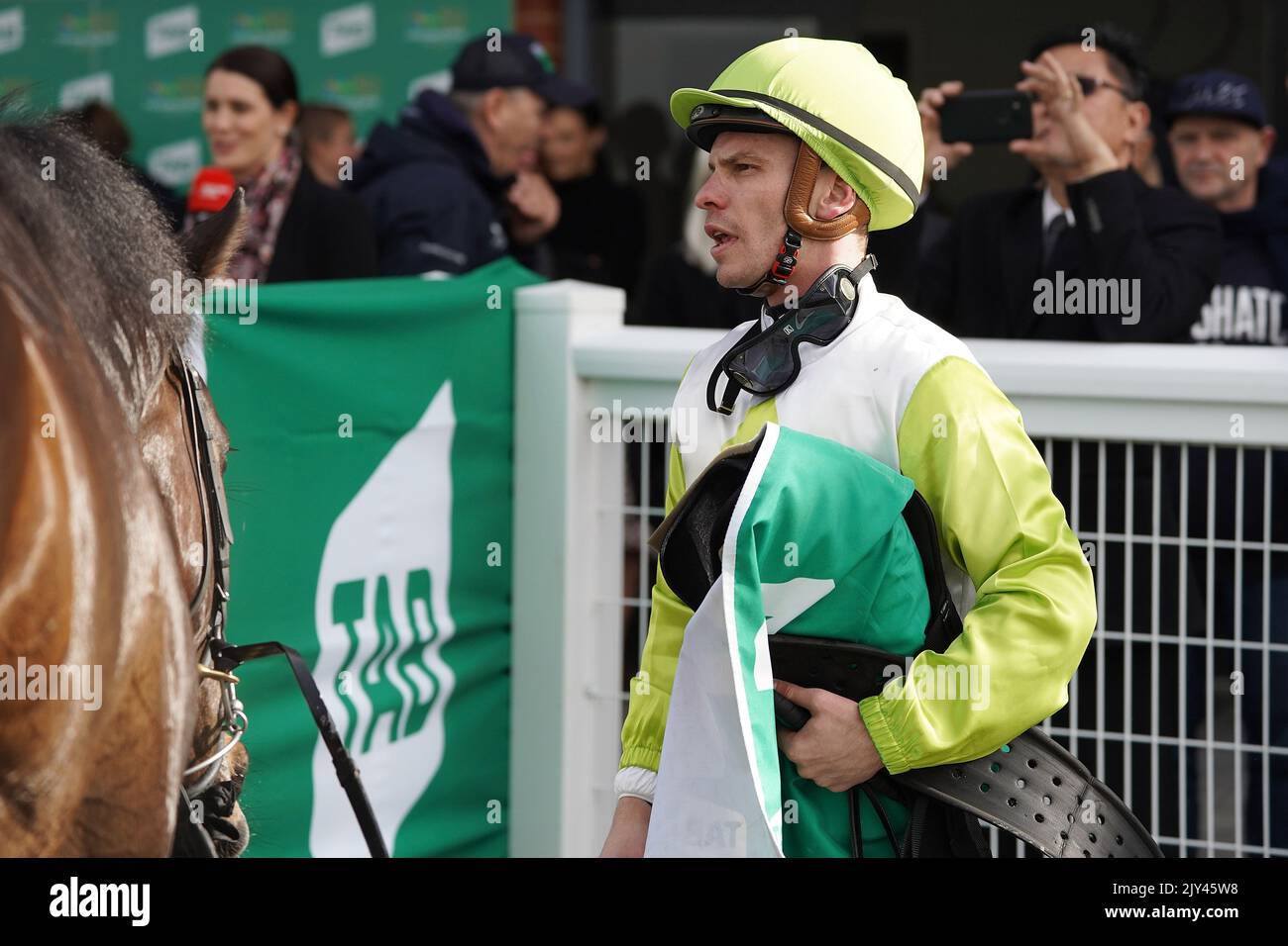 Jockey Ben Melham returns to the scale after riding So He Rules to ...