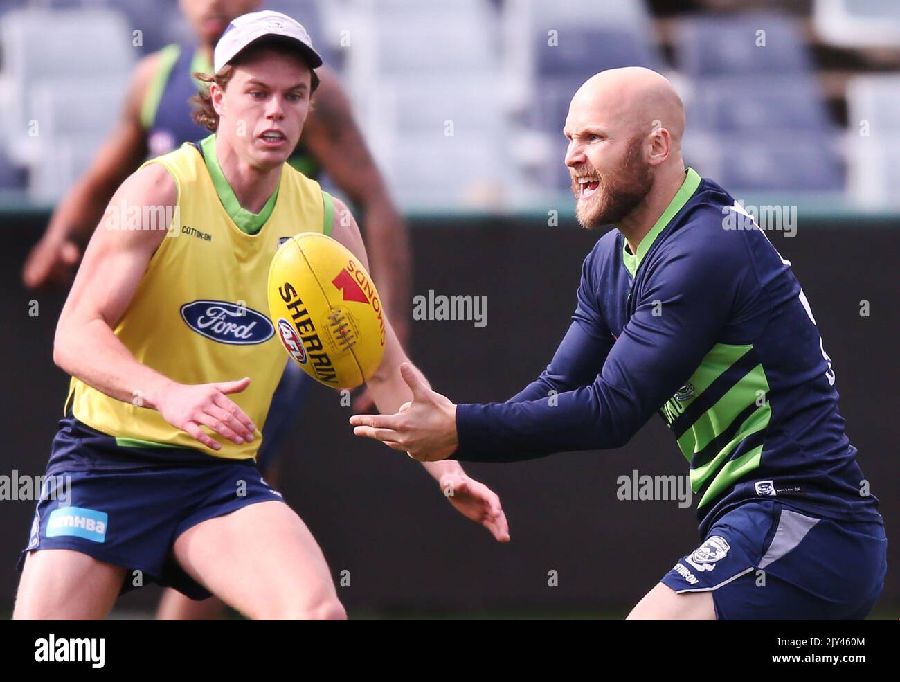 Gary Ablett of the Cats handballs during a Geelong Cats training ...