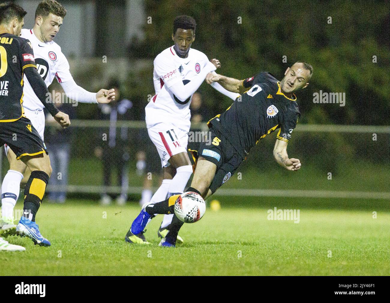 Bruce Kamau for the Wanderers and Ivan Franjic of the Glory during the ...