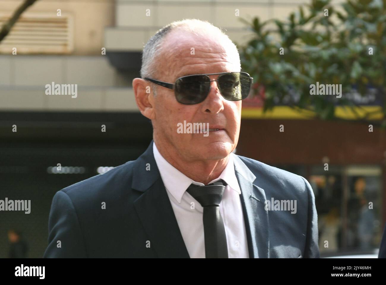Chris Dawson arrives at the Downing Centre Courts in Sydney, Thursday ...