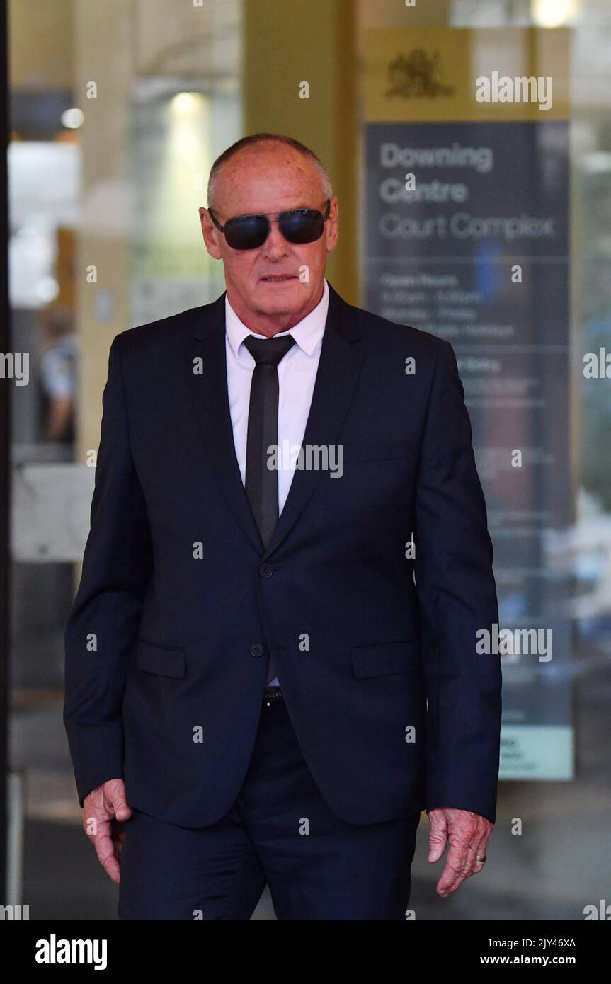 Chris Dawson (left) leaves Downing Centre Courts in Sydney Thursday ...