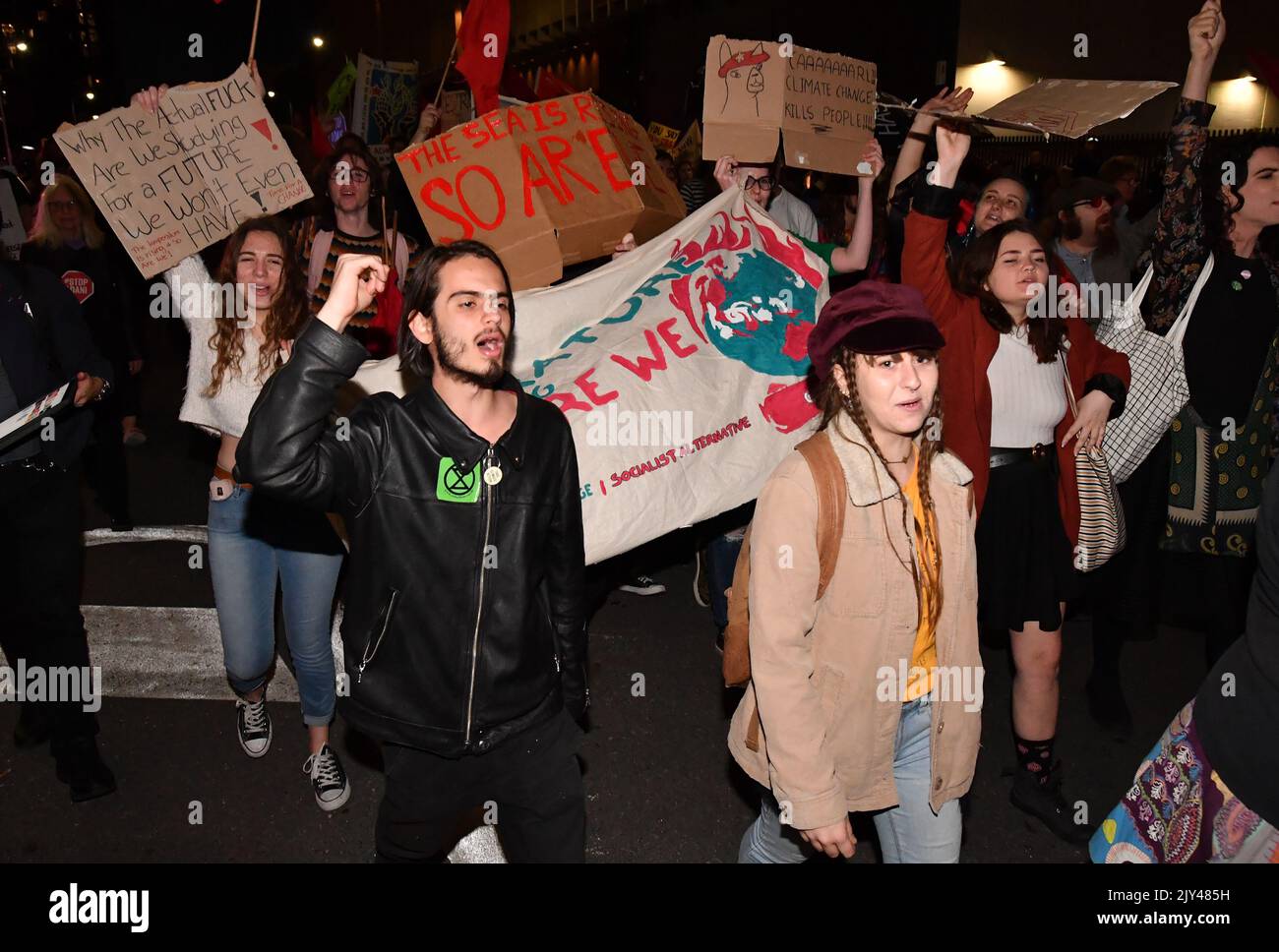 Environmental activist Eric Herbert (left) is seen with climate change ...