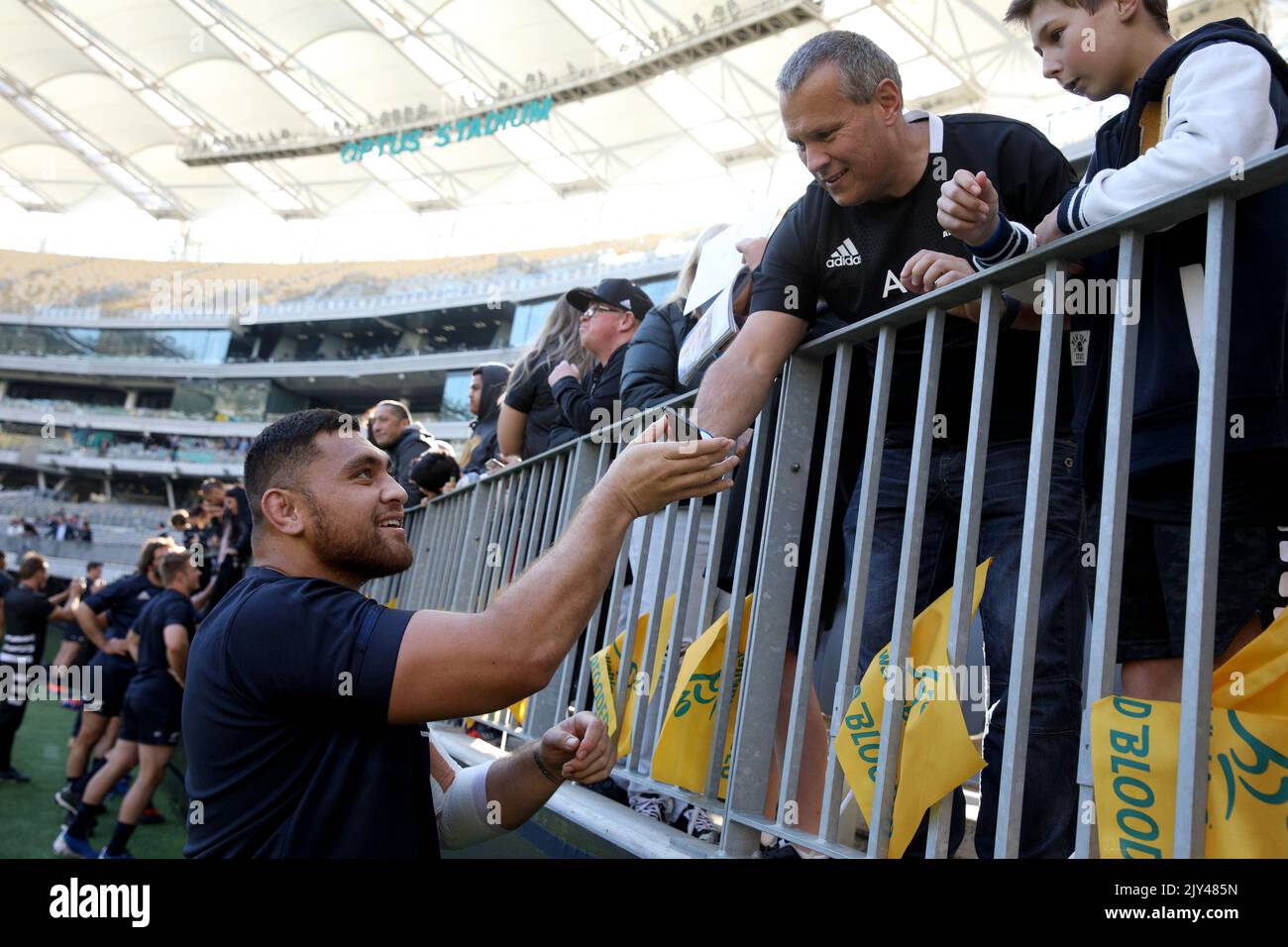 Atu Moli of the All Blacks signs autographs after the New Zealand All ...