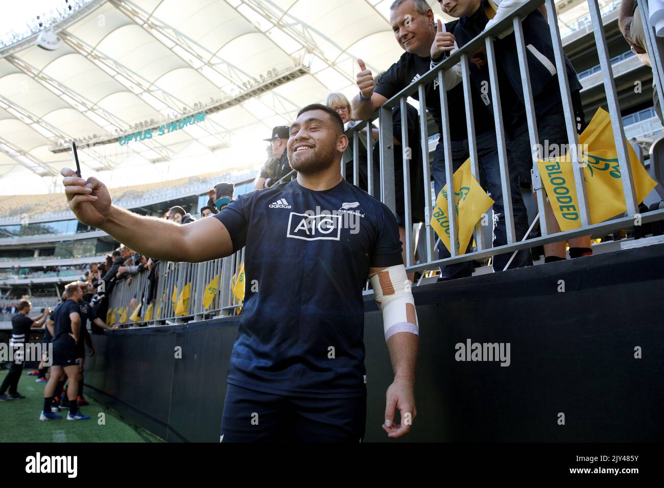 Atu Moli of the All Blacks signs autographs after the New Zealand All ...