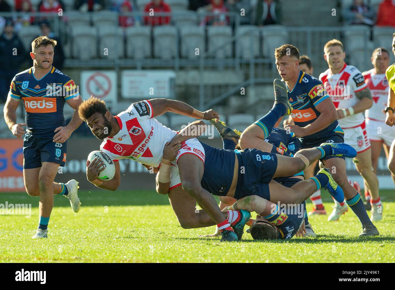 Mikaele Ravalawa of the Dragons gets tackled during the Round 21 NRL ...