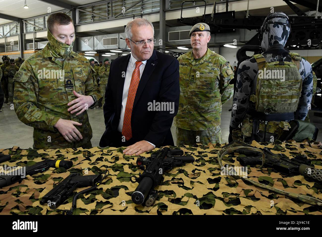 Prime Minister Scott Morrison inspects weaponry as he meets with ...
