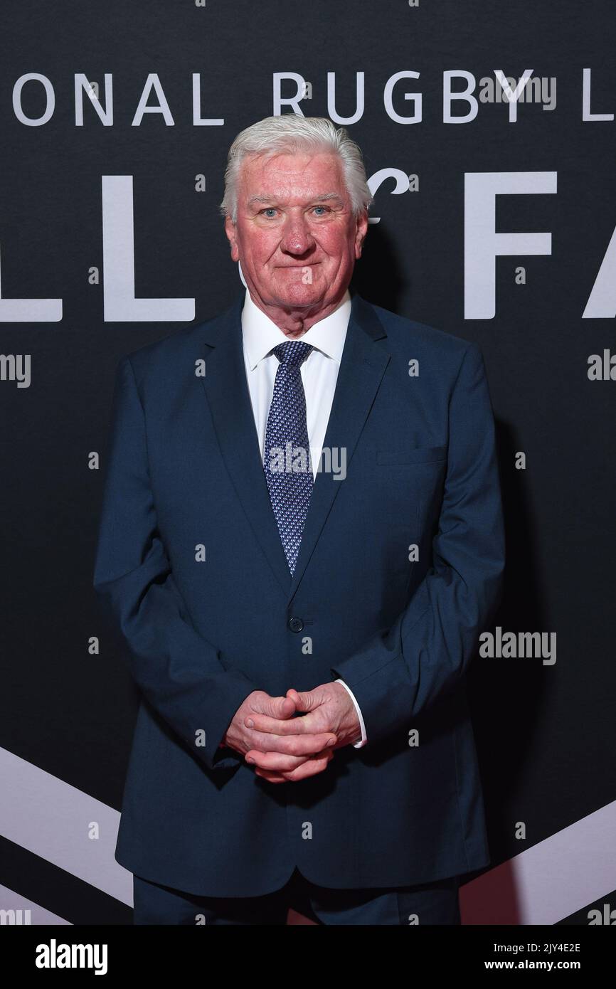 Ray Warren poses for a photo on the red carpet at the 2019 NRL Hall of ...