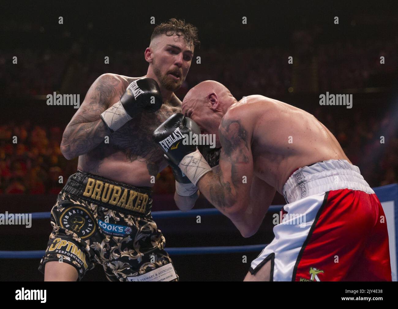 Jack Brubaker hits Danny Kennedy during their welterweight bout at the ...
