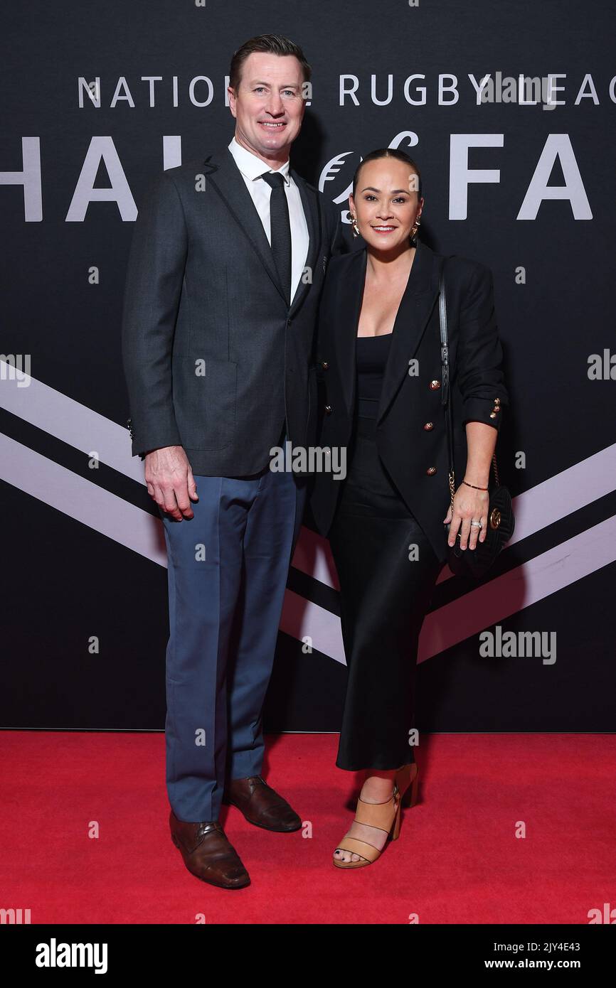 Steve Menzies and wife Suyin pose for a photo on the red carpet at the ...