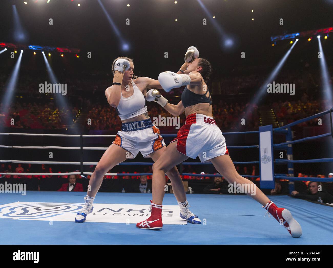 Tayla Harris hits Renee Gartner during their middleweight bout at the ...