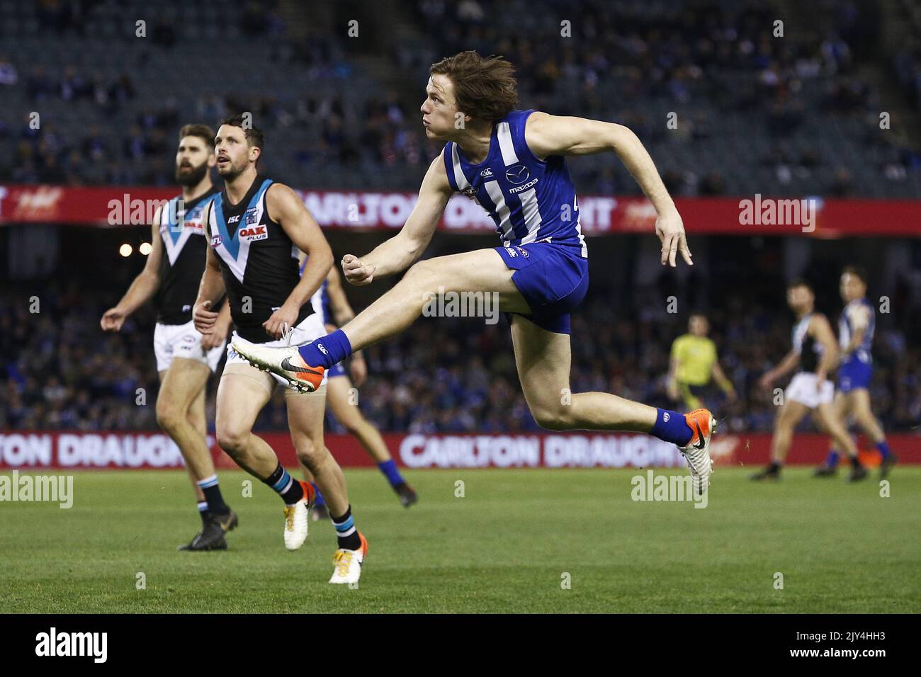Jared Polec of the Kangaroos kicks a goal during the Round 22 AFL match ...