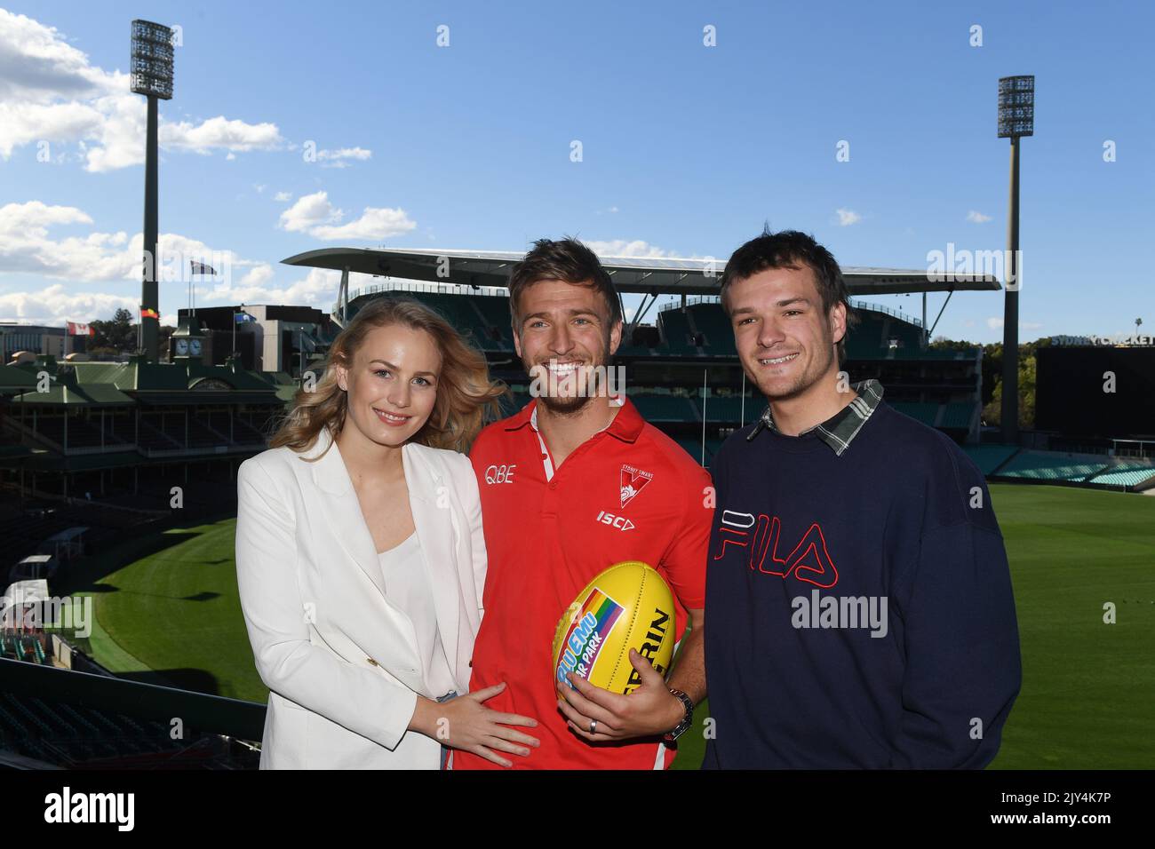 Former Sydney Swans co-captain Kieren Jack (centre) with his wife ...