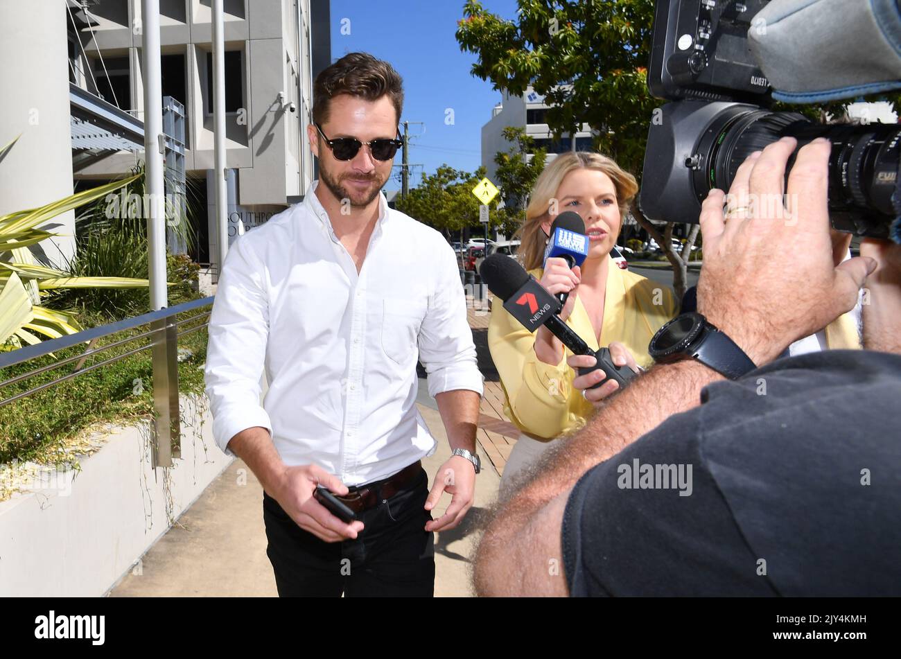 Neighbours actor Scott McGregor (left) leaves the Southport Magistrates ...