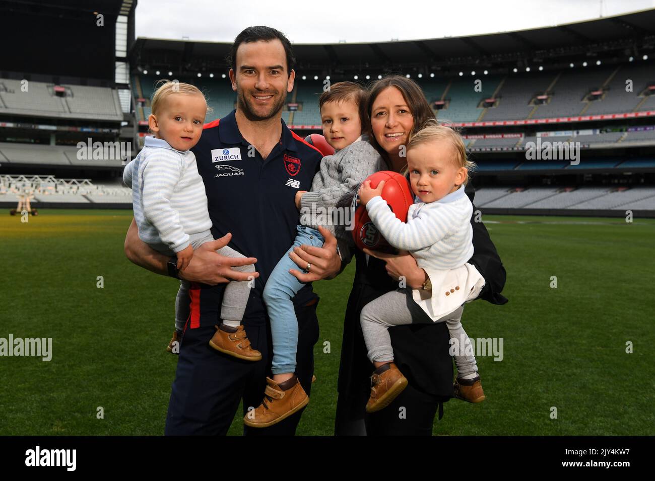 Jordan Lewis and wife Lucy pose for a photograph with kids Hugh ...