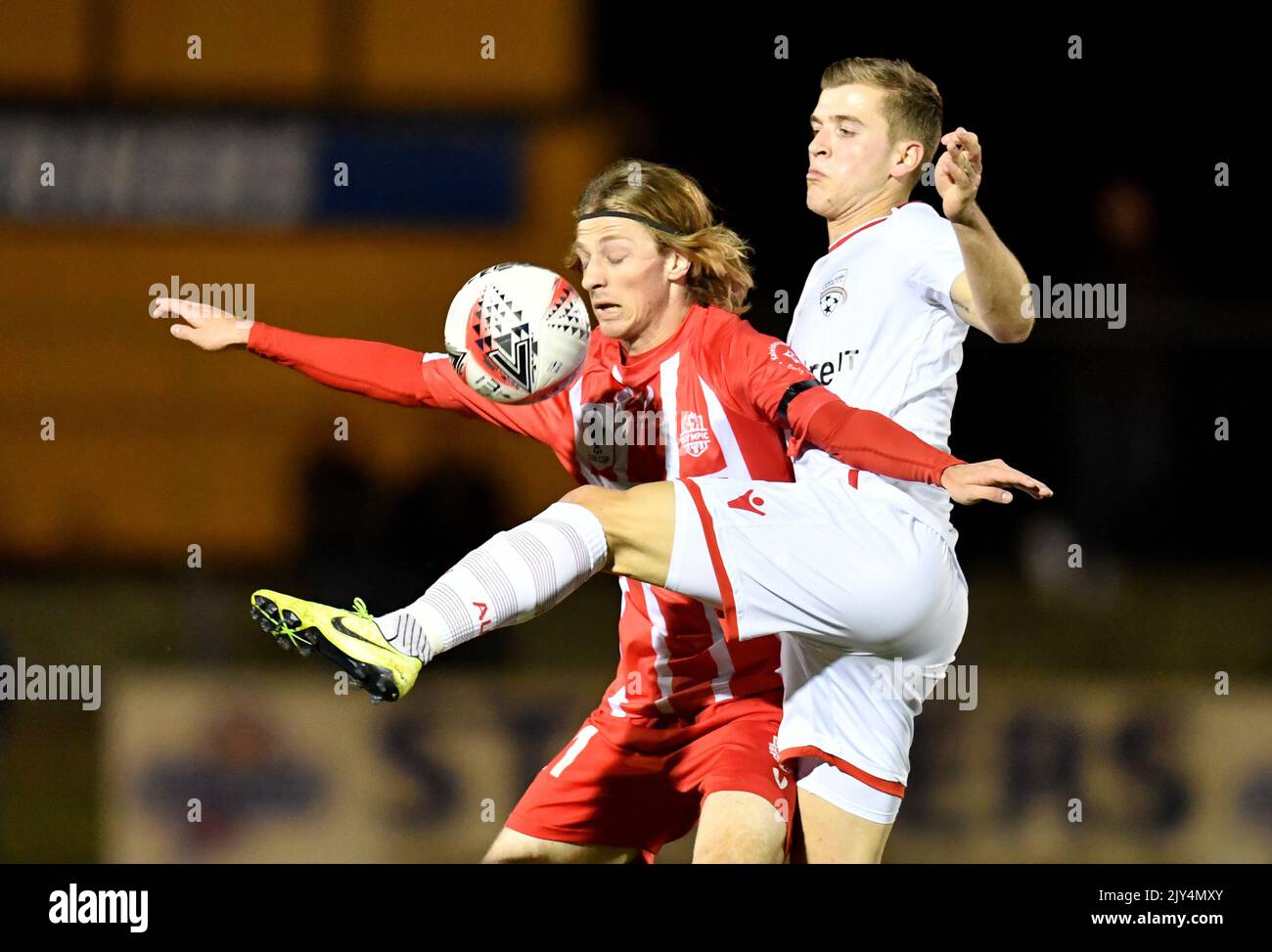Jez Lofthouse (left) of Olympic takes on Riley McGree (right) of United ...