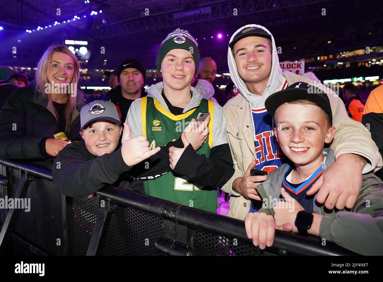 Basketball fans pose for a photograph during match 1 of the Pre-FIBA ...