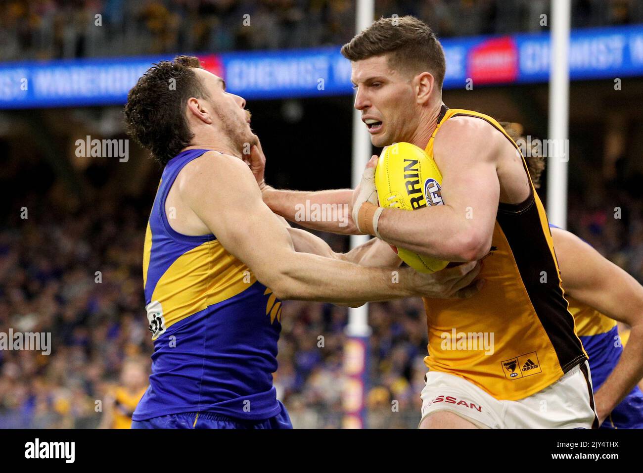 Luke Breust (right) of the Hawks and Luke Shuey of the Eagles in action ...
