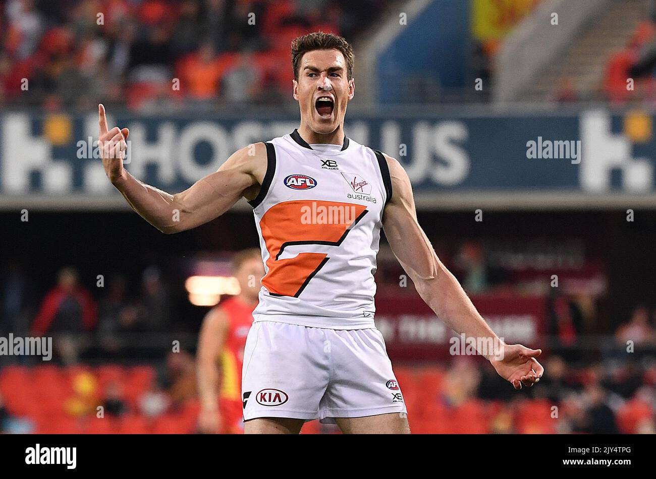 Jeremy Cameron of the Giants reacts after kicking a goal during the ...