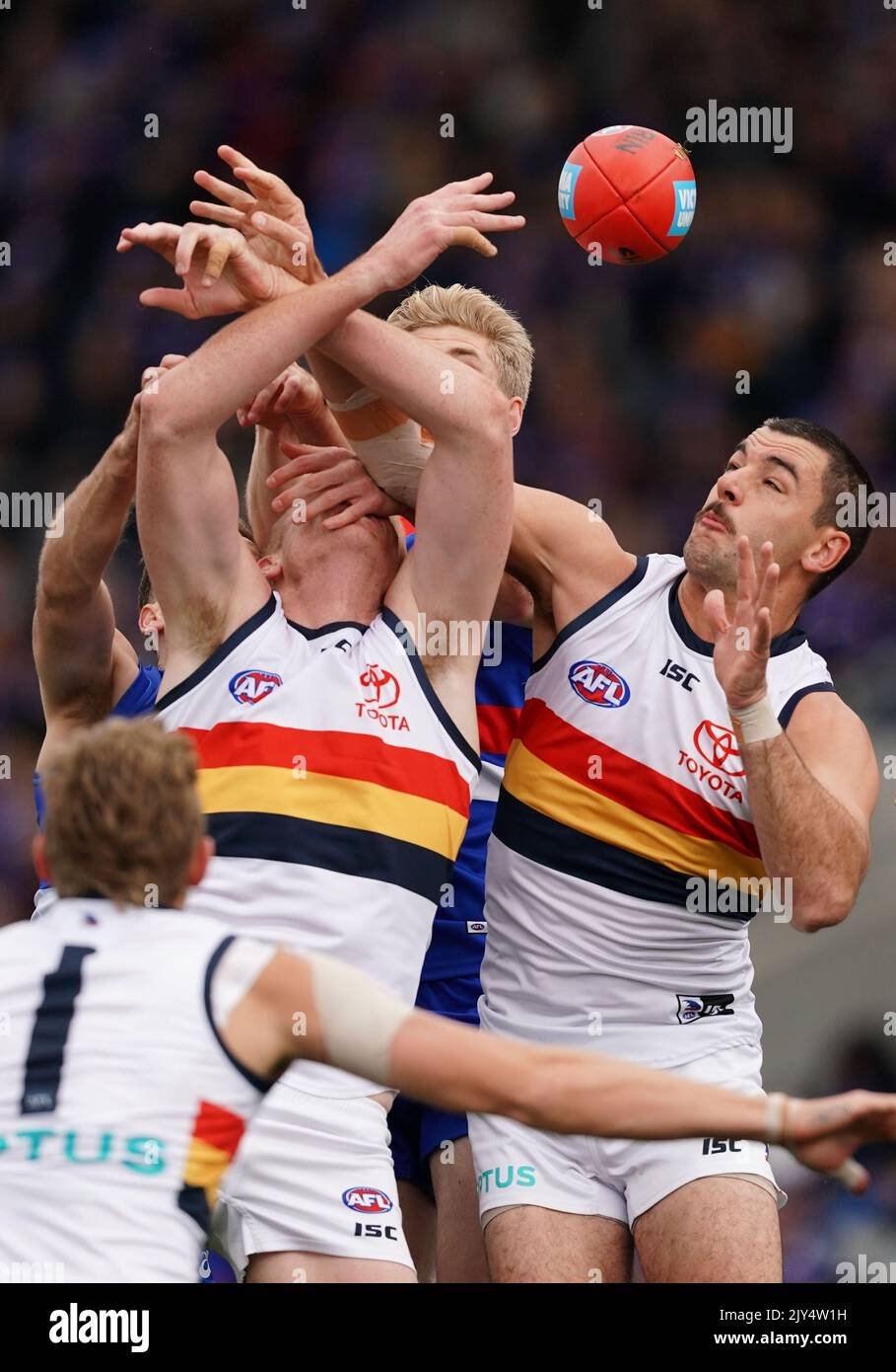 Taylor Walker of the Crows and Sam Jacobs of the Crows compete for the ...