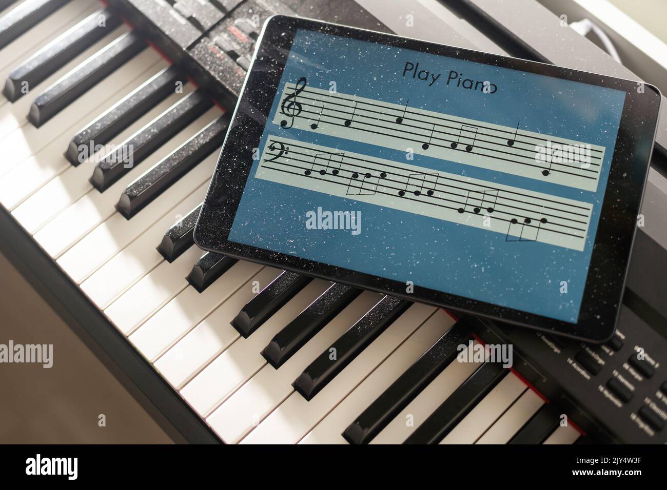 Virtual piano lesson hi-res stock photography and images - Alamy