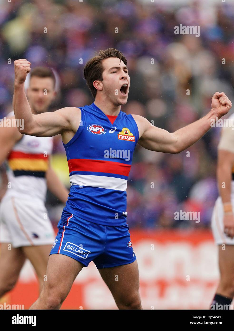 Rhylee West of the Bulldogs celebrates after kicking a goal during the ...