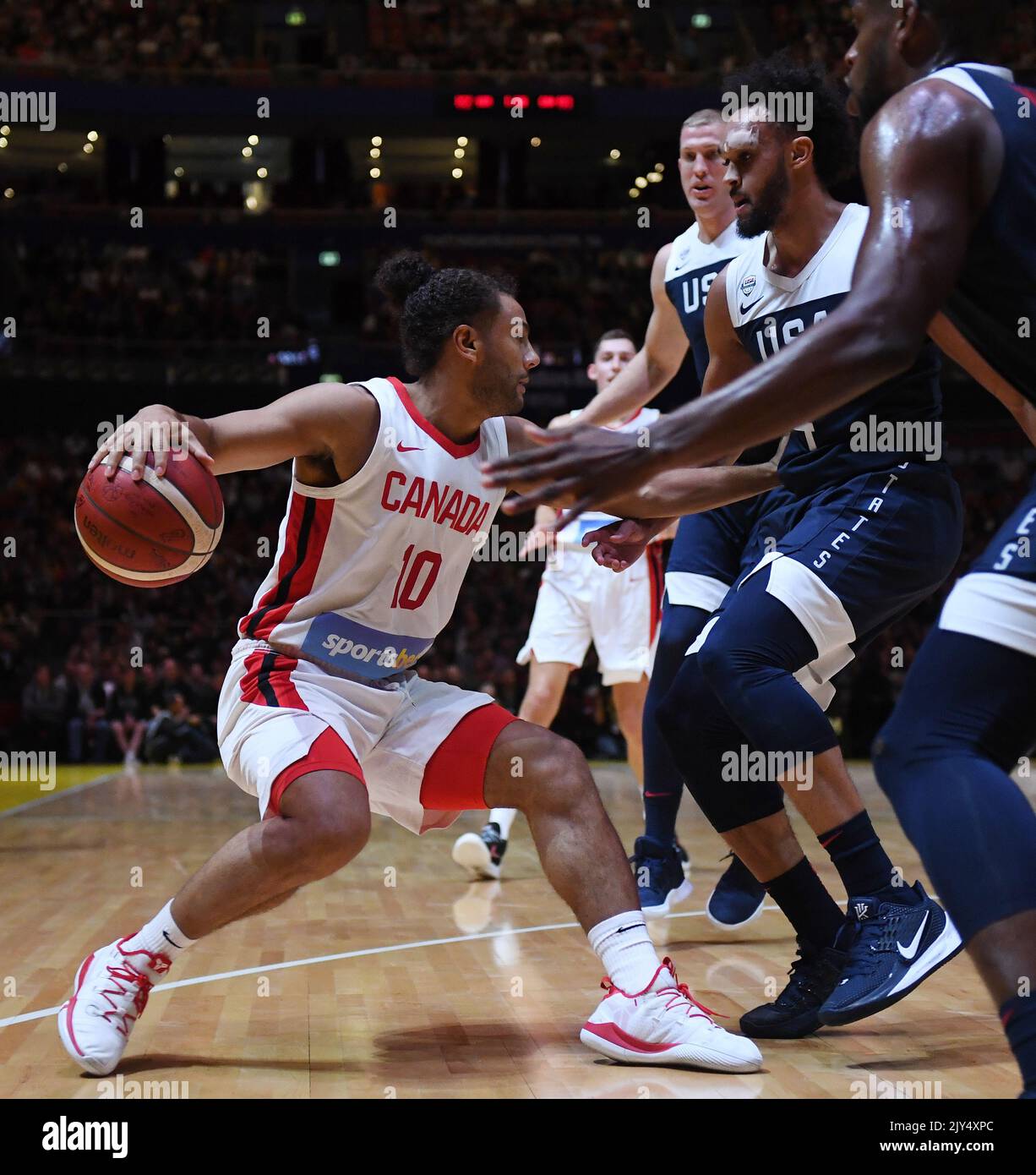 Kaza Kajami-Keane of Canada comes up against USA's defence during the ...