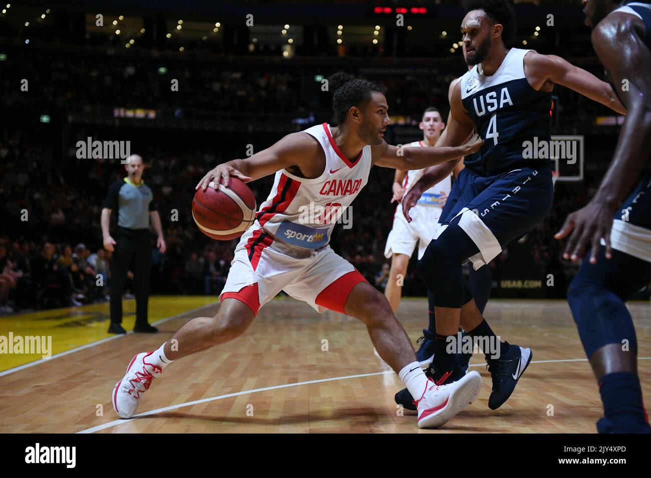 Kaza Kajami-Keane of Canada comes up against Derrick White of the USA ...