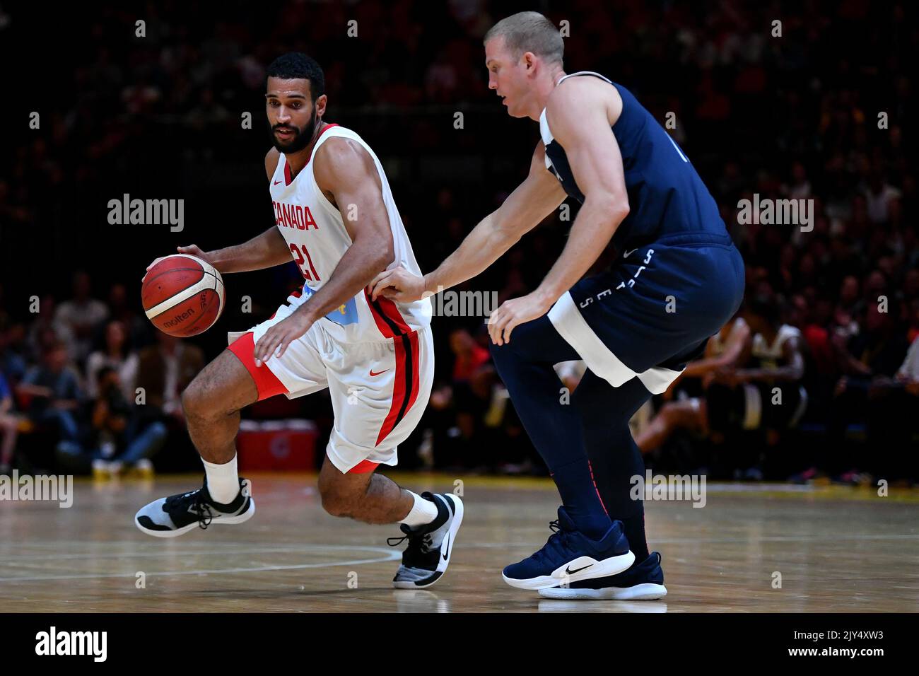Thomas Scrubb of Canada comes up against Mason Plumlee of the USA ...