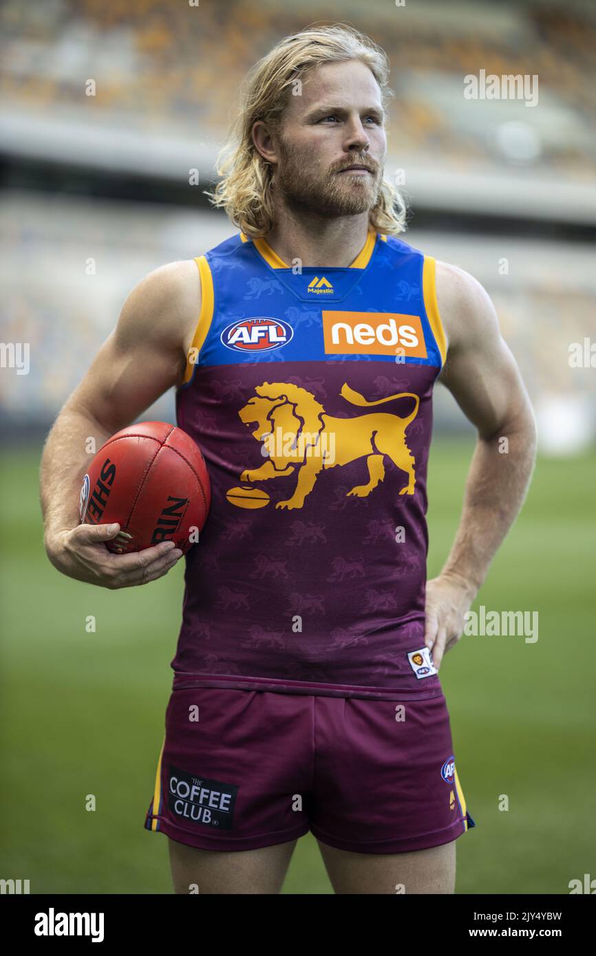 Brisbane Lions player Daniel Rich poses for a photograph during a media ...