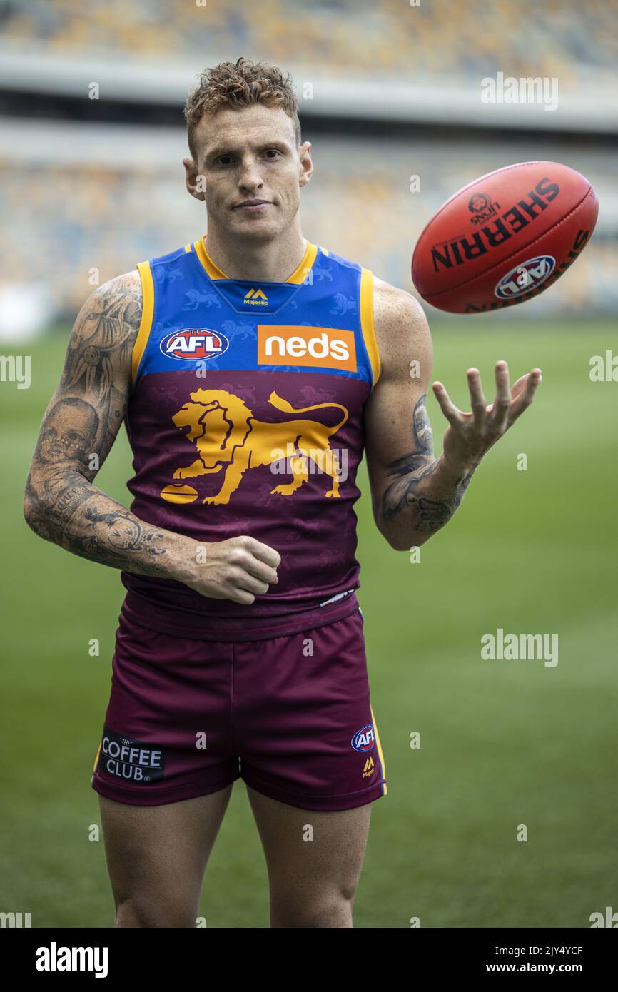 Brisbane Lions player Mitch Robinson poses for a photograph during a ...