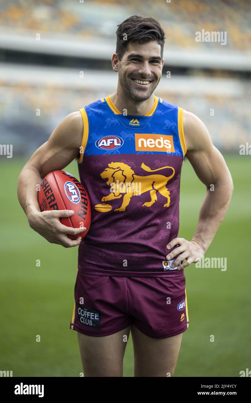 Brisbane Lions player Marcus Adams poses for a photograph during a ...