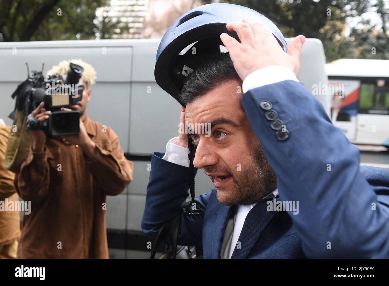 Former Federal Labor Senator Sam Dastyari arrives by bicycle to the ...